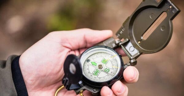 What causes compass bubbles and how they impact navigation